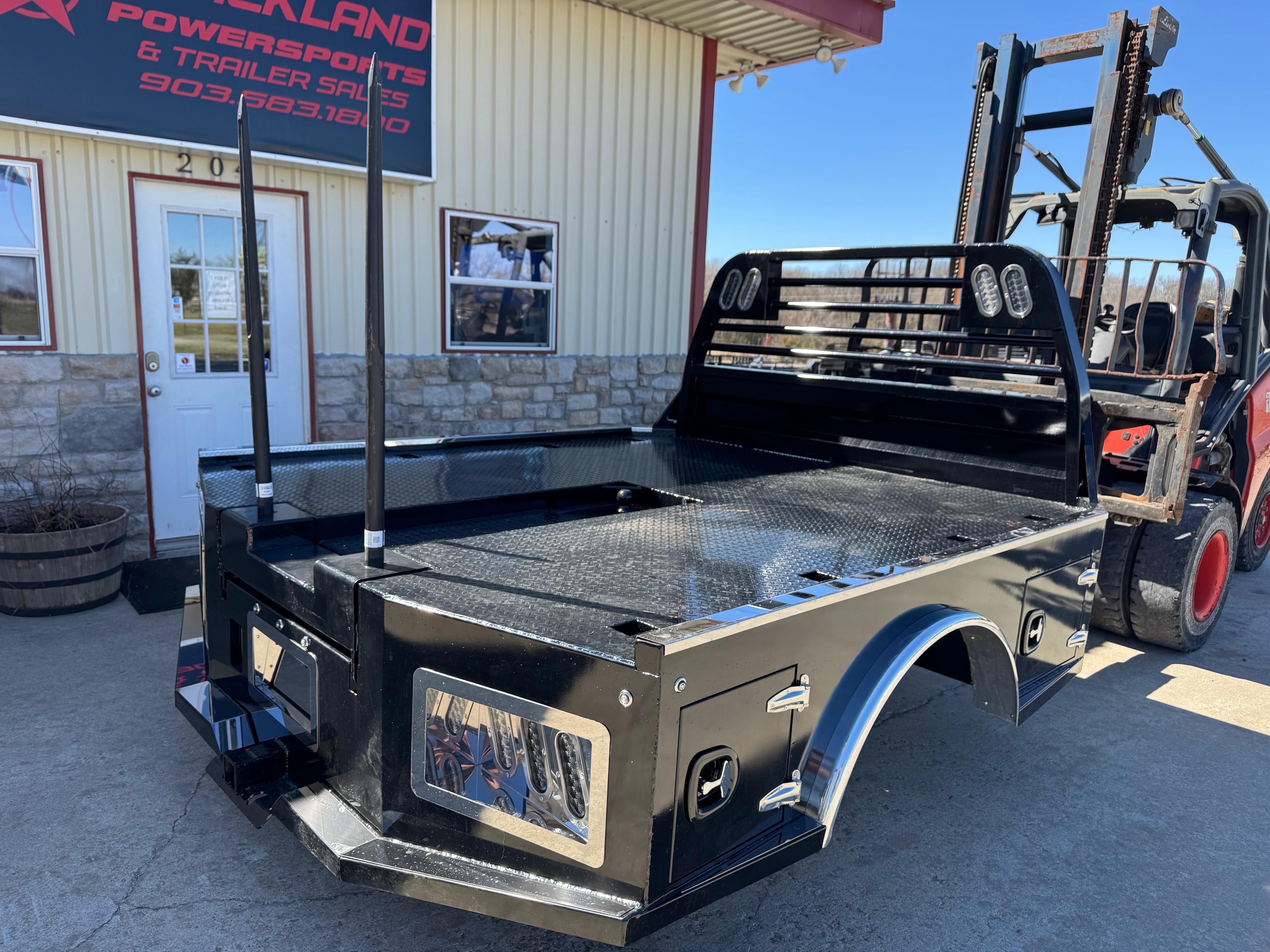 2025-Iron-Ox-Skirted-Flatbed-with-Hay-Spikes-(Dodge-Dually)-Chrome-Package-1259 - Blackland Trailers